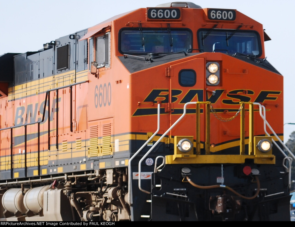 BNSF 6600 zoom in shot of the cab as she rolls eastbound on a Very Cold December Morning in ...